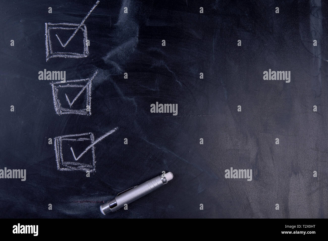 blackboard with check boxes and chalk pencil Stock Photo - Alamy