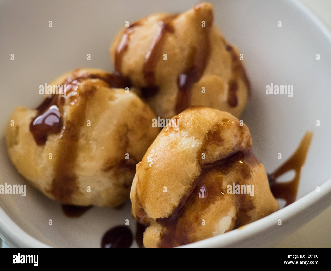 Profiteroles white chocolate in hi-res stock photography and images - Alamy