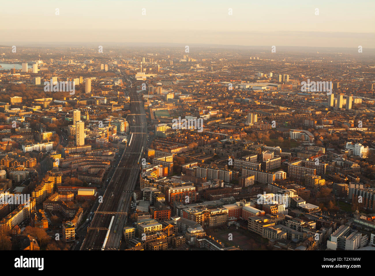 Elevated view of a city at sunset Stock Photo - Alamy