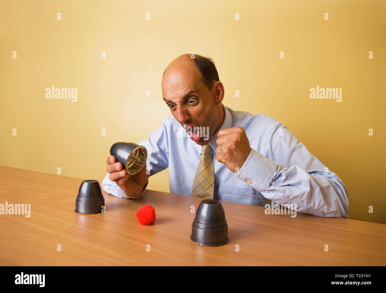Magic tricks cups hi-res stock photography and images - Alamy