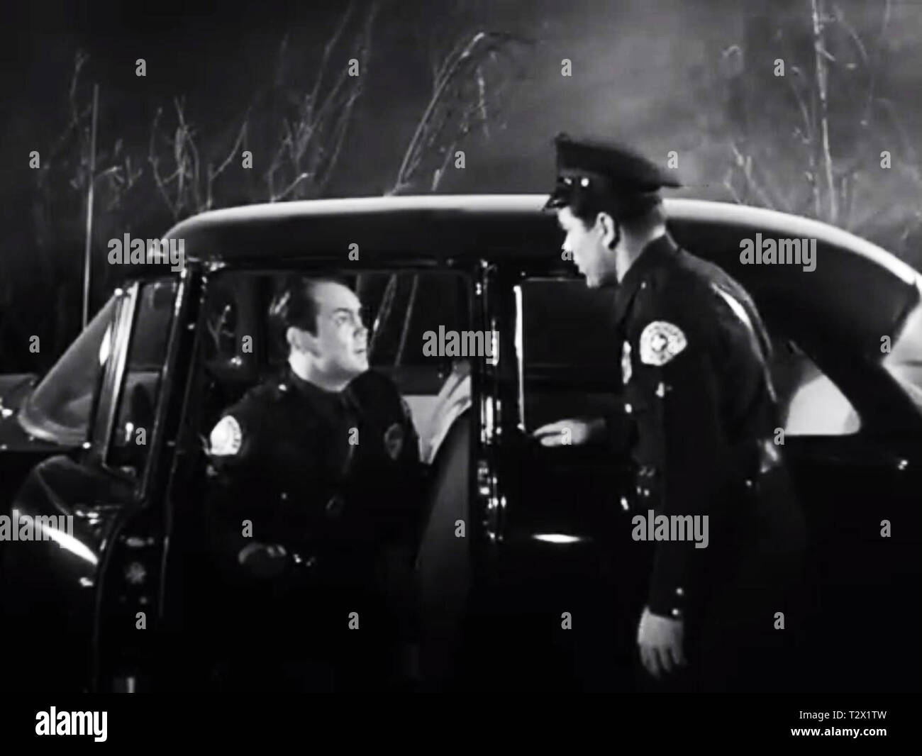 cops searching in an old black and white films (plan 9 from outer space ...
