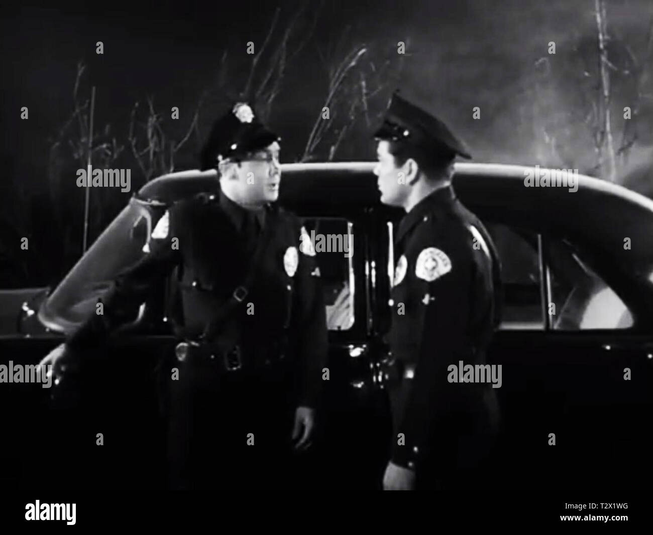 cops searching in an old black and white films (plan 9 from outer space ...