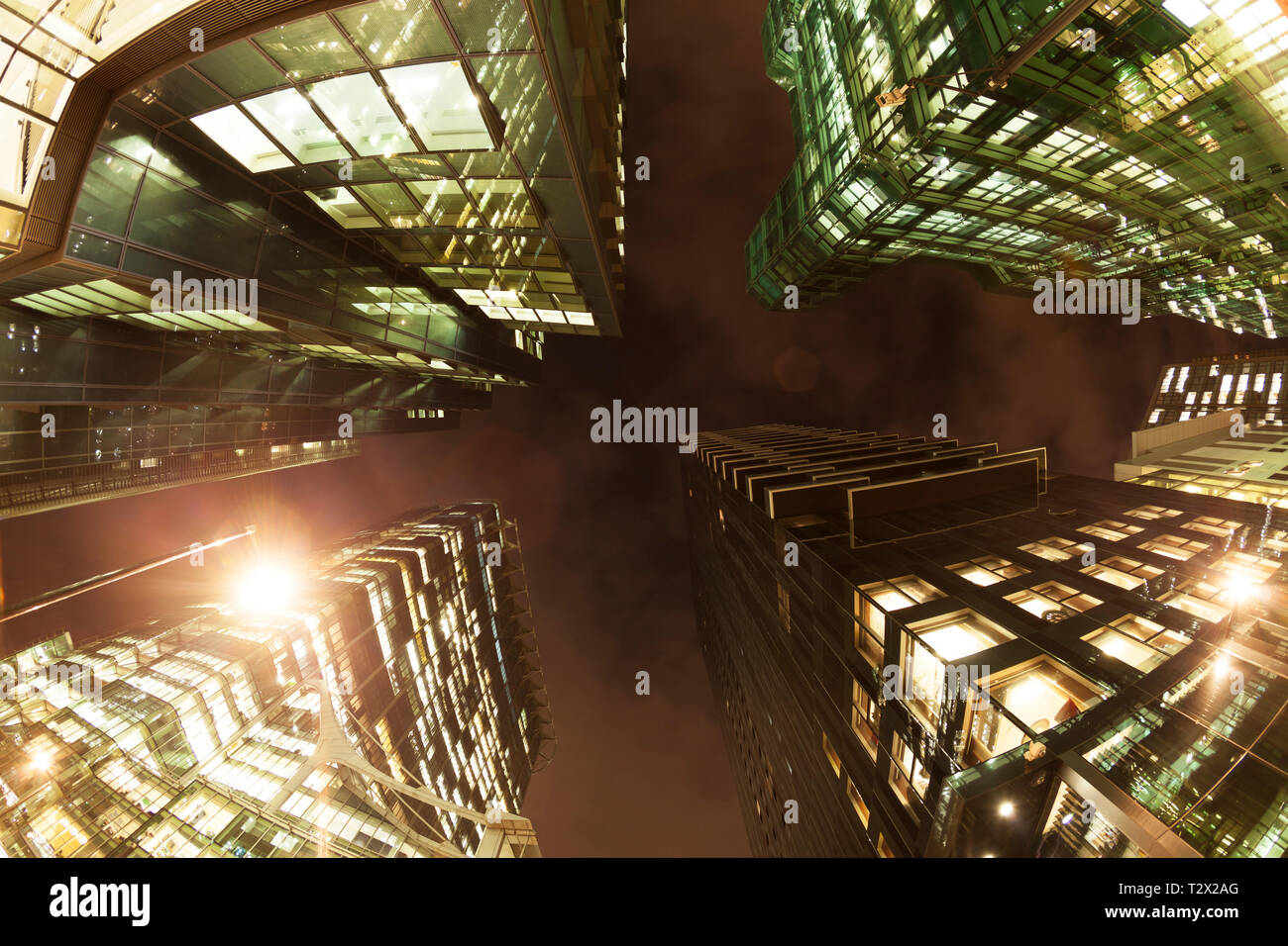 Low angle fish eye view of office buildings at dusk Stock Photo - Alamy