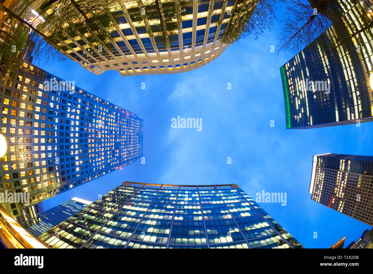 Low angle fish eye view of office buildings at dusk Stock Photo - Alamy
