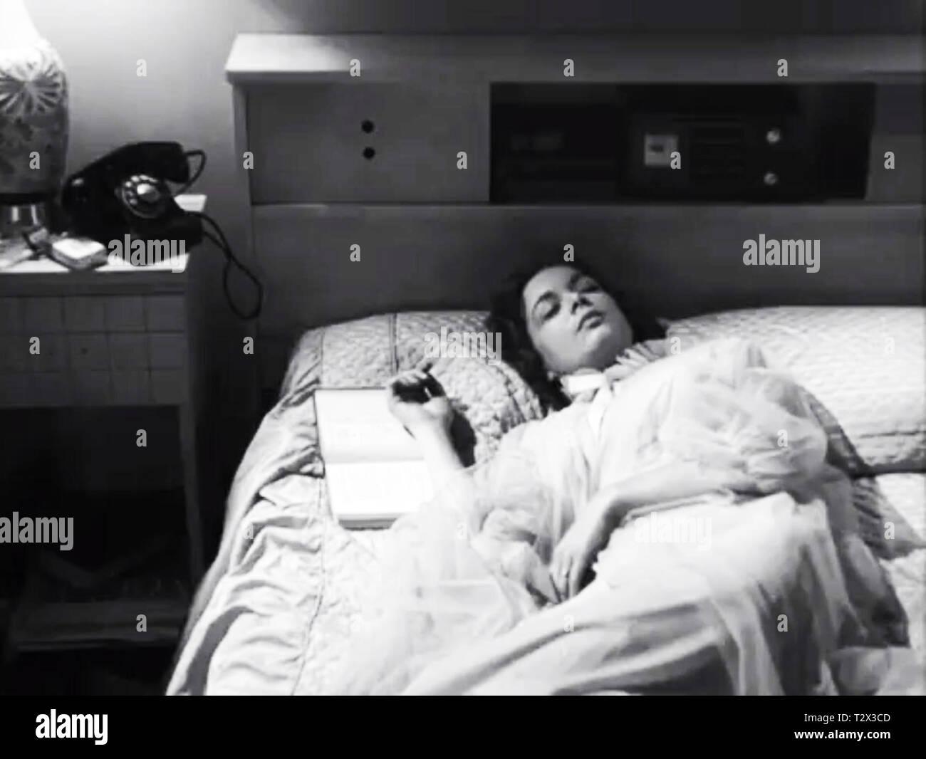 Actress sleeping in her bad Stock Photo - Alamy