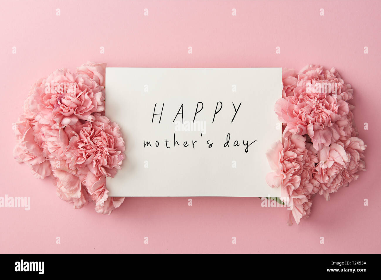 Top View Of Greeting Card With Happy Mothers Day Lettering And Pink