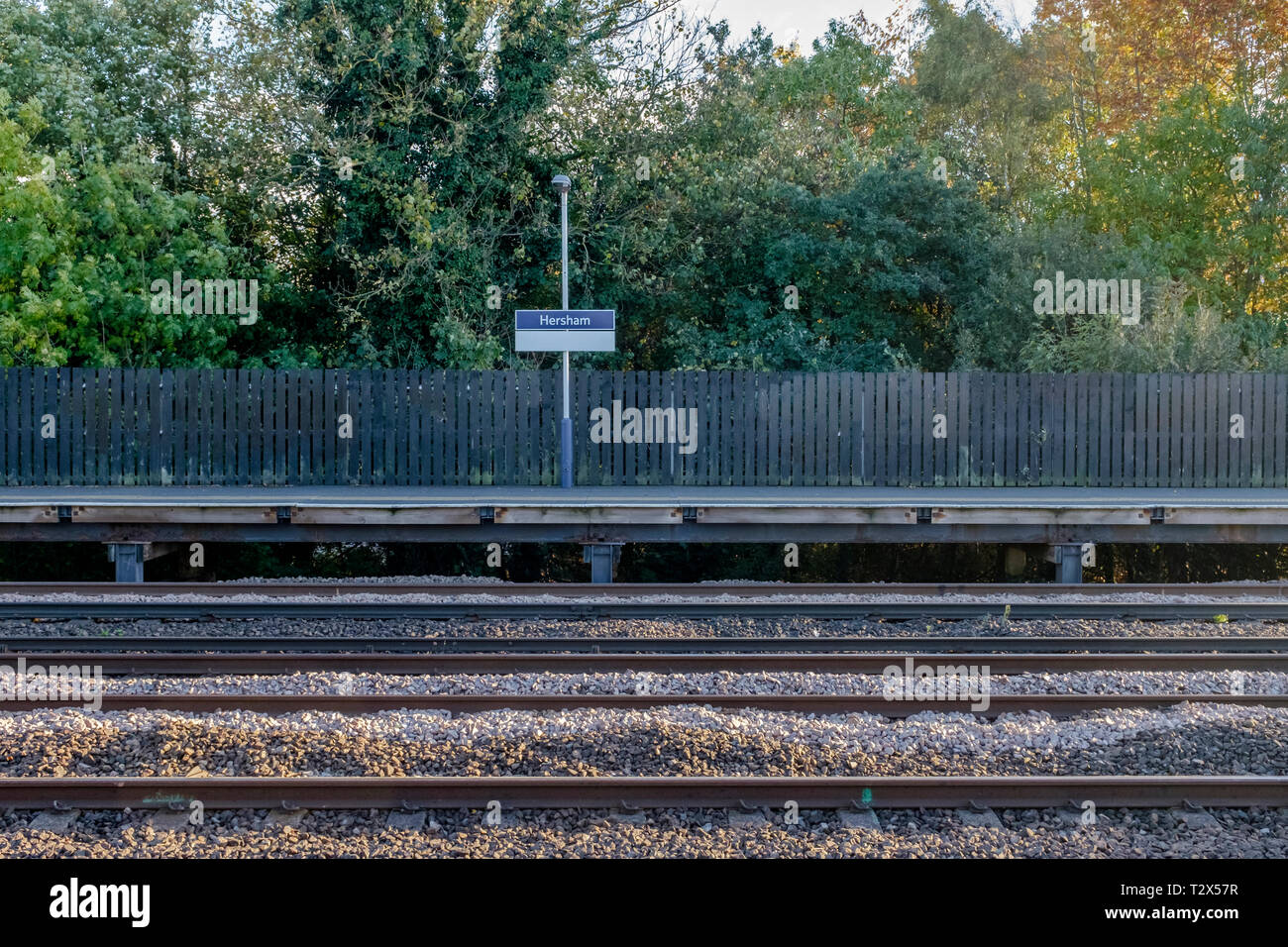 On platform of Hersham train station Stock Photo - Alamy