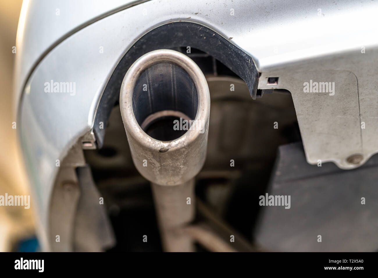 The exhaust system in the car seen from below, the car is on the lift ...