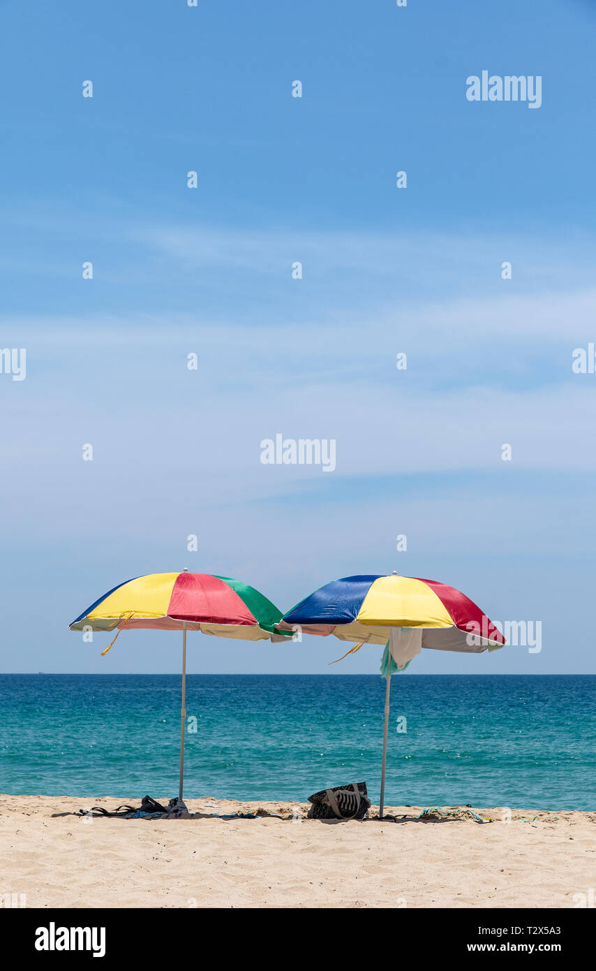 Two umbrellas on the beach hi-res stock photography and images - Alamy