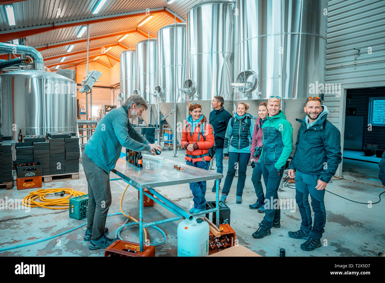 Tourists tasting beer at the Qajaq brewery, Narsaq, Greenland Stock ...