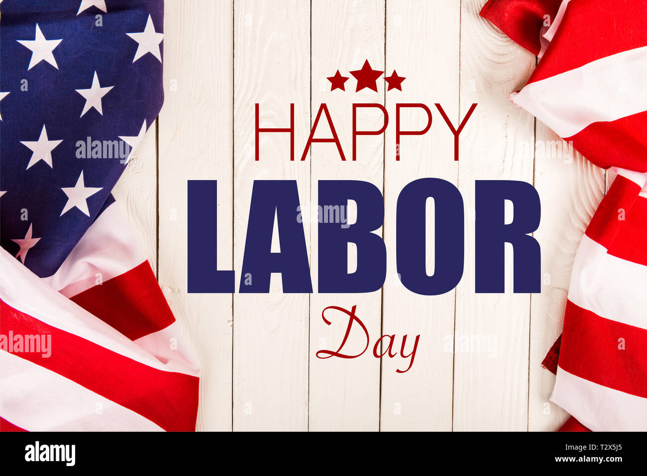 top view of american flags and happy labor day lettering on white ...