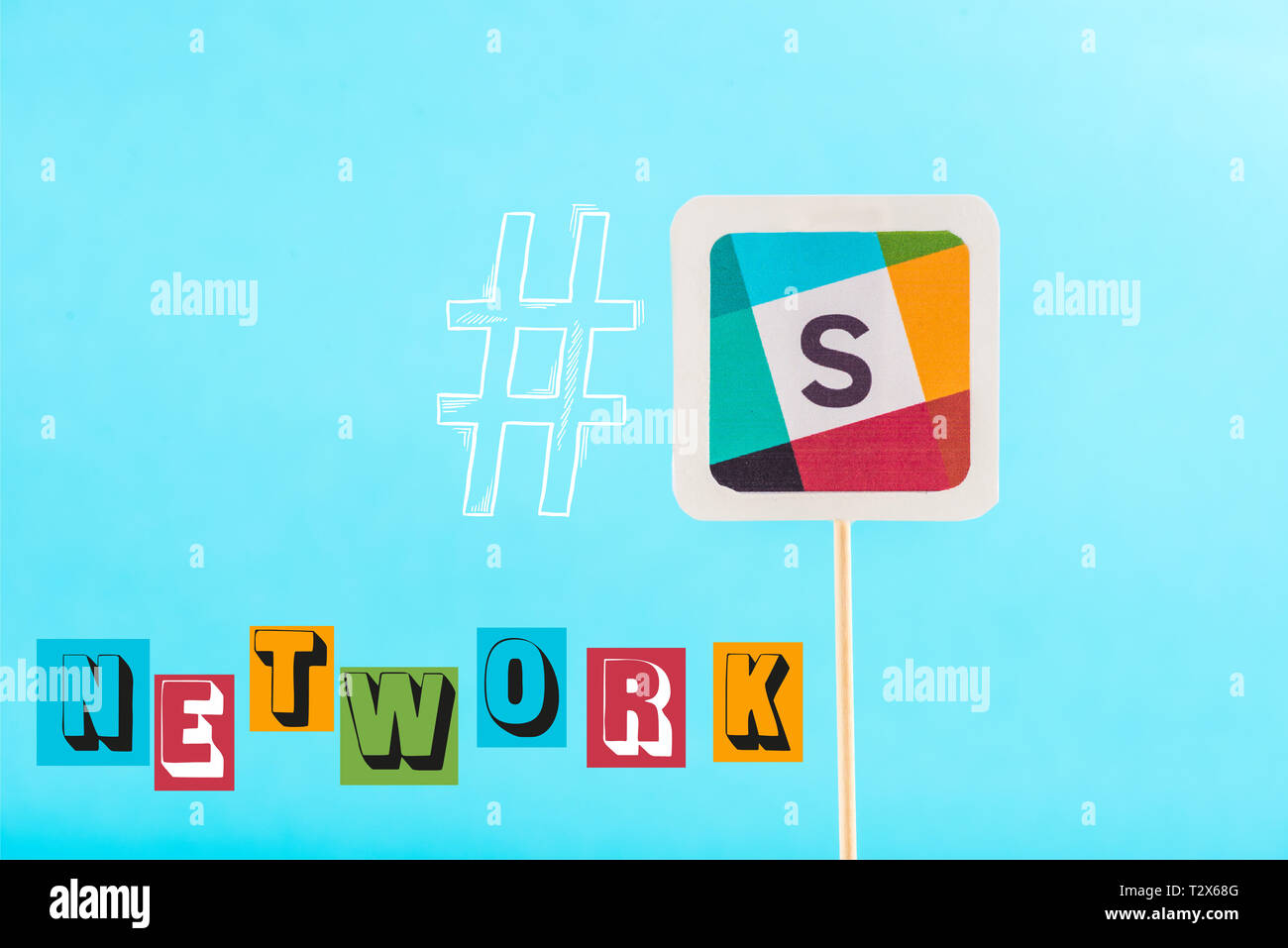 card with slack logo, network lettering and hashtag isolated on blue ...