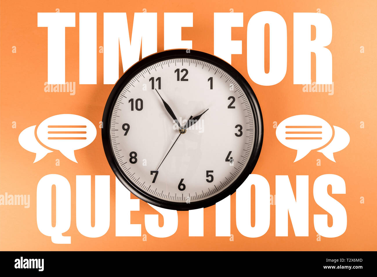 round clock with white time for questions lettering and speech bubbles ...