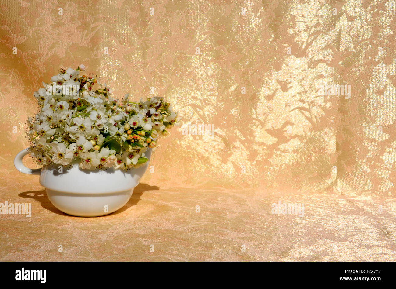 Bodegon with wild flowers in a bowl, giving it a warm touch by putting ...