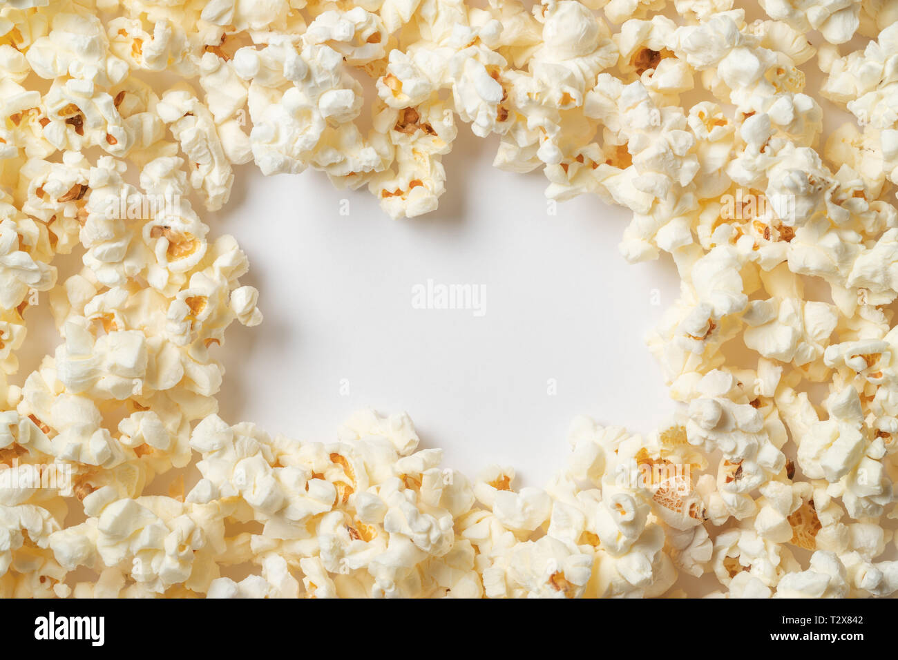 Popcorn on white background with empty space for text. Top view Stock ...