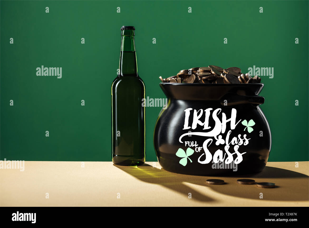 beer bottle and black pot with golden coins with irish lass full of ...