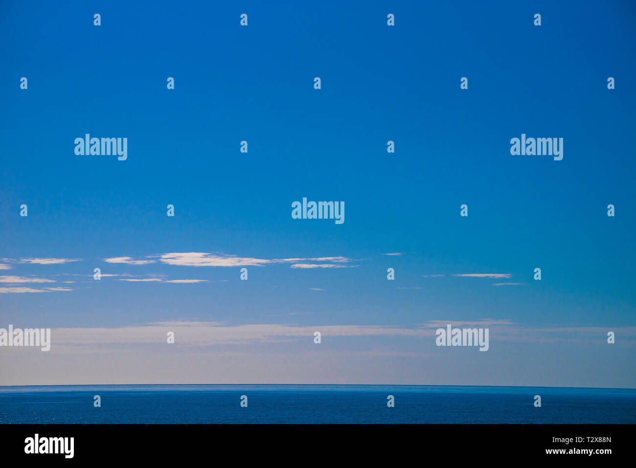 View to the pacific ocean big blue sky Stock Photo - Alamy