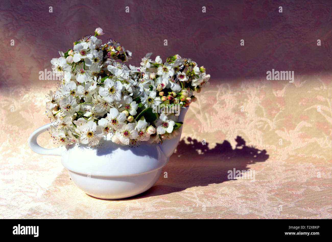 Bodegon with wild flowers in a bowl, giving it a warm touch by putting ...