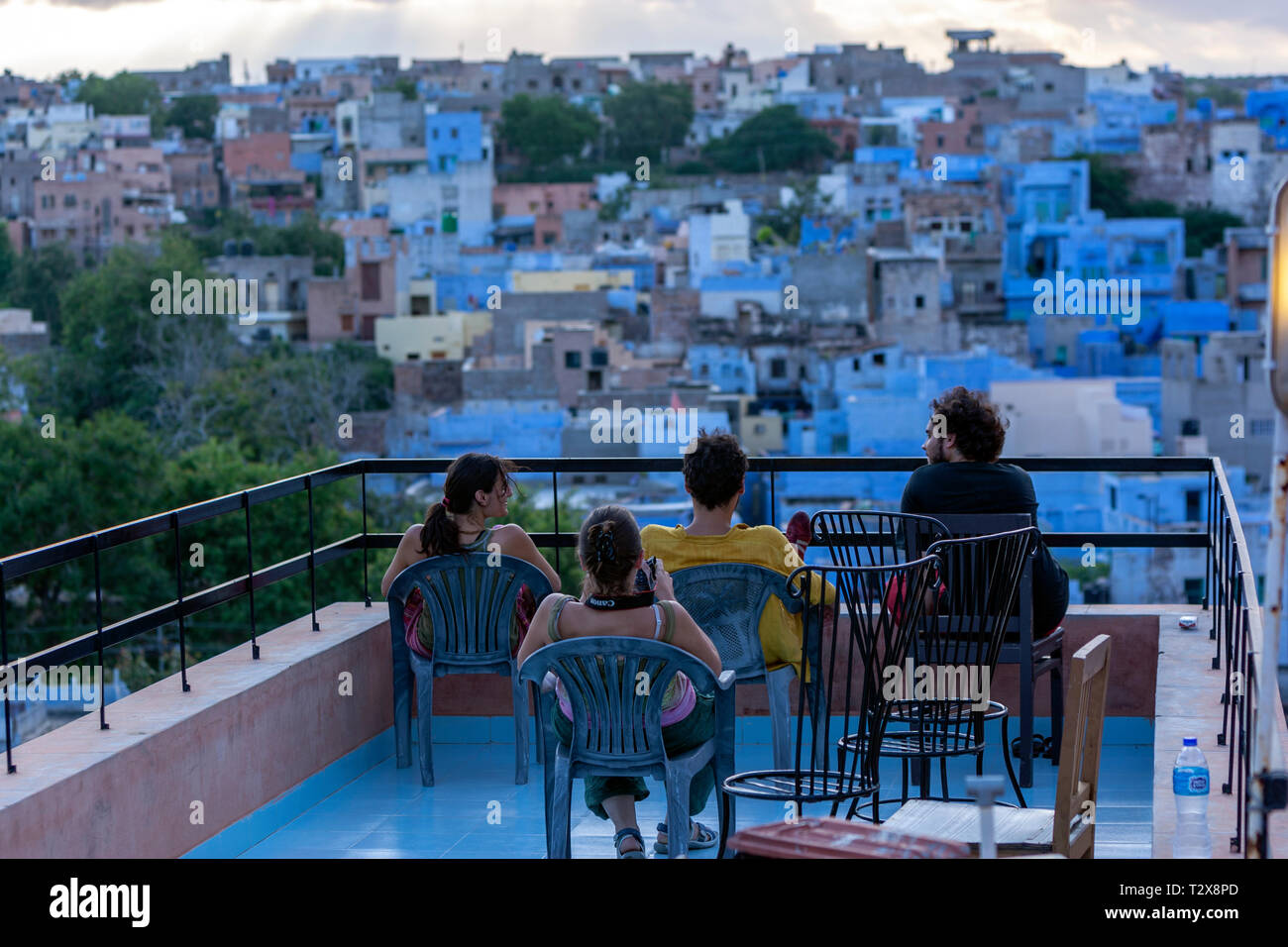 Tourists in a hotel terrace viewing The Blue City, Jodhpur, Rajasthan ...