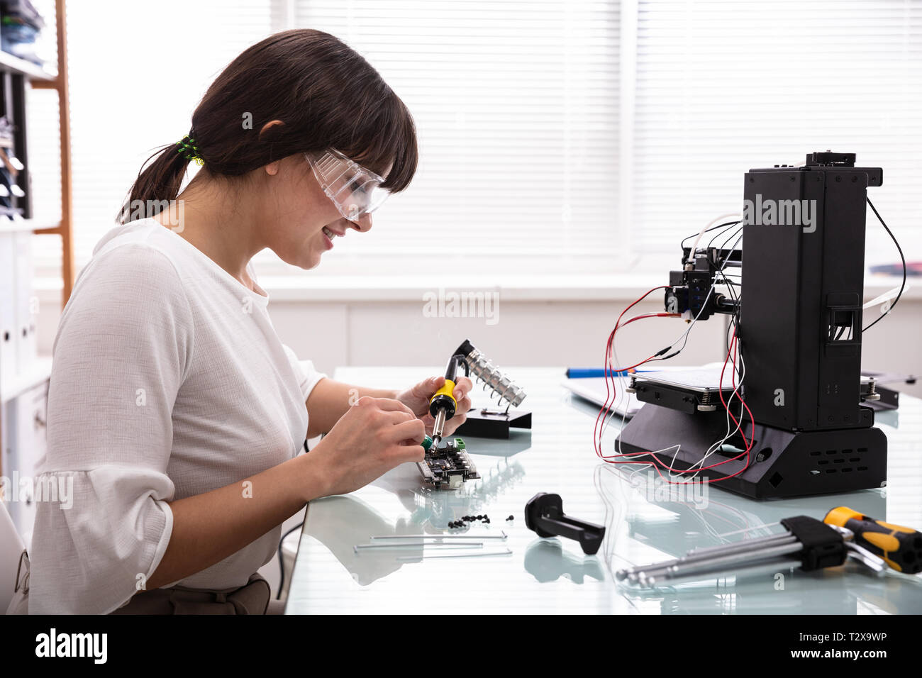 Lady working in welding factory hi-res stock photography and images - Alamy