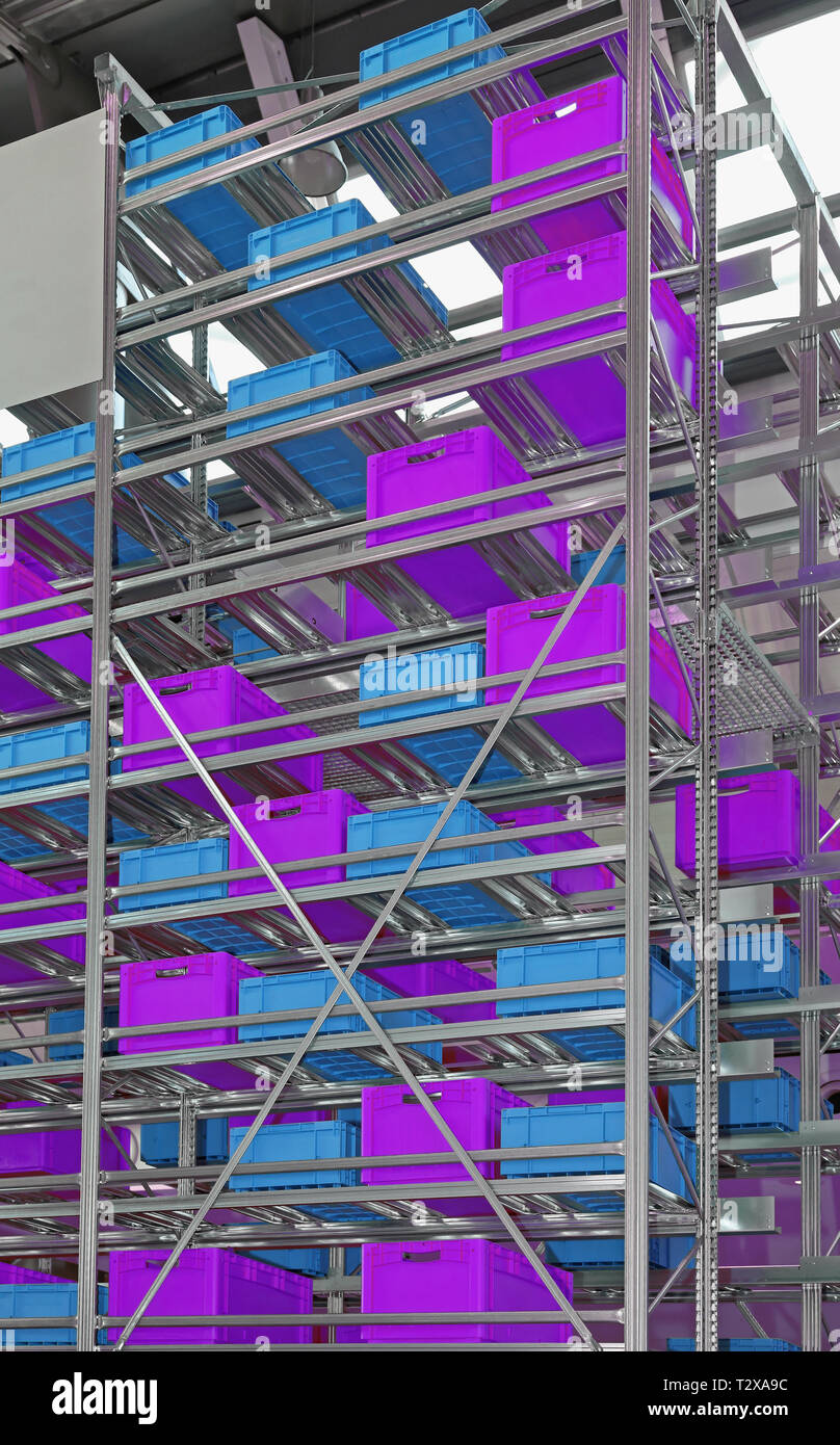 Warehouse Shelving System With Plastic Crates and Boxes Stock Photo - Alamy