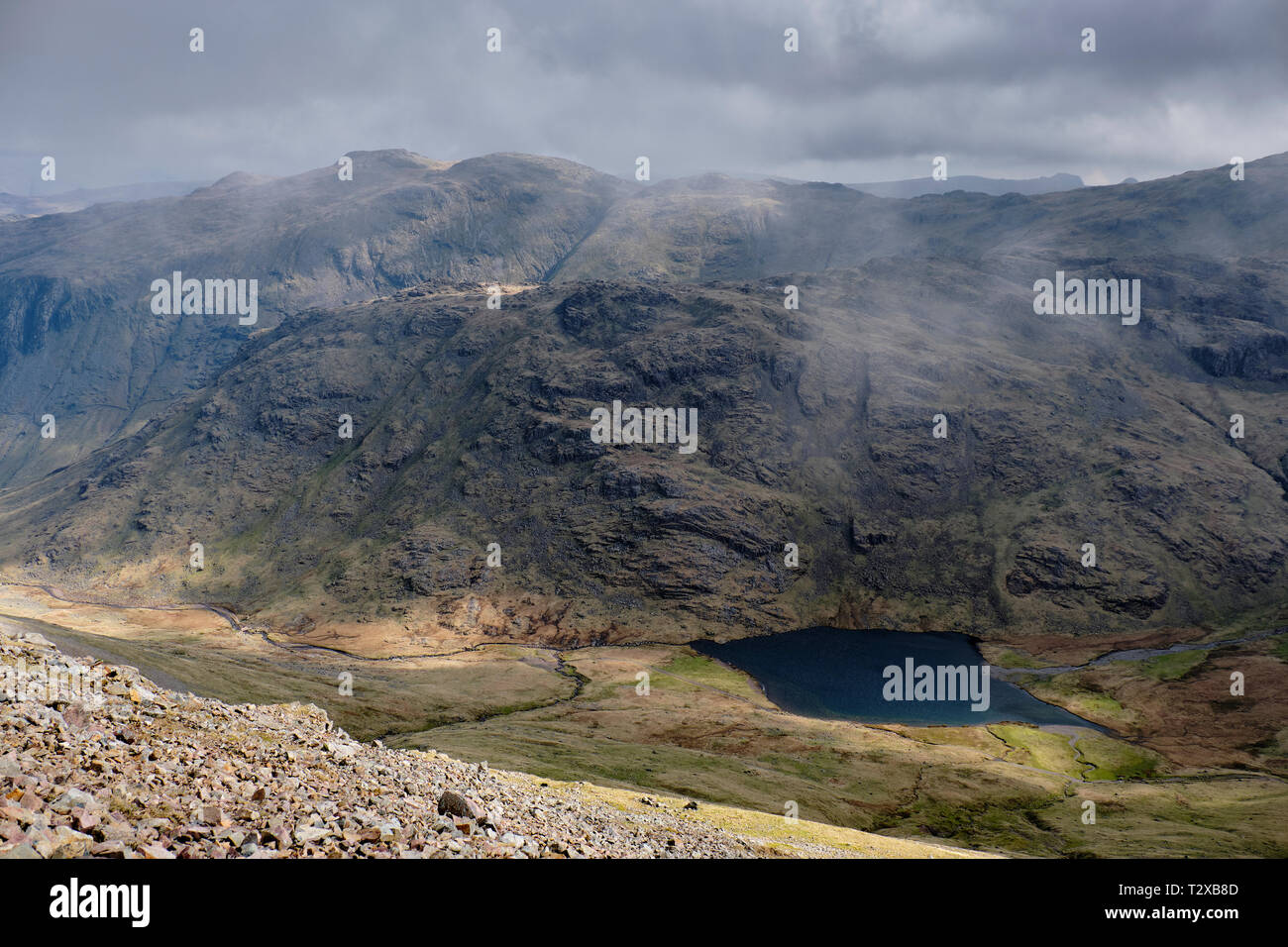 Styhead Tarn through the mist, as seen from the descent of Great Gable ...