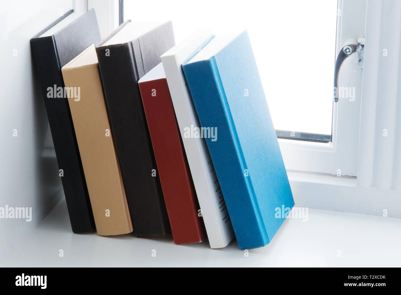 Closeup of books in window Stock Photo - Alamy