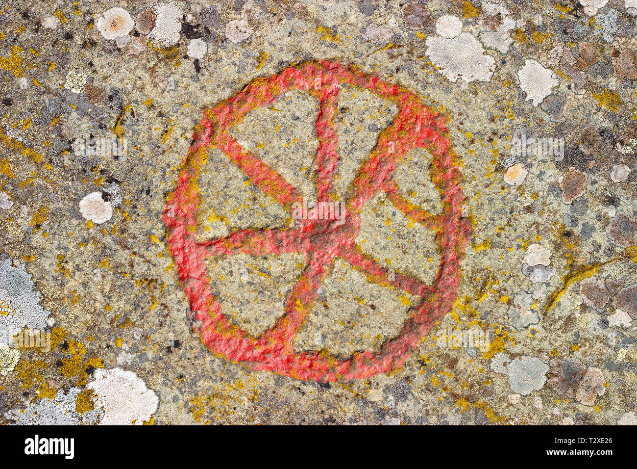 wheel cross rock carvings on a cliff Stock Photo - Alamy