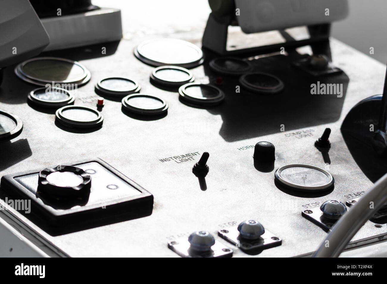 Instruments and gauges on a dashboard used by a boat captain when ...