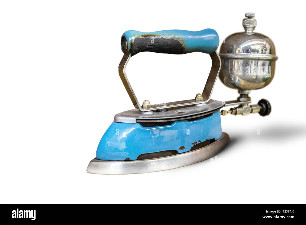 Antique Coleman iron, powered by fuel Stock Photo - Alamy