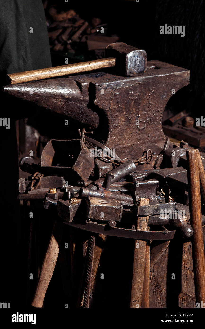 Viking sword handles in sword rack at Viking reenactment event. Many ...