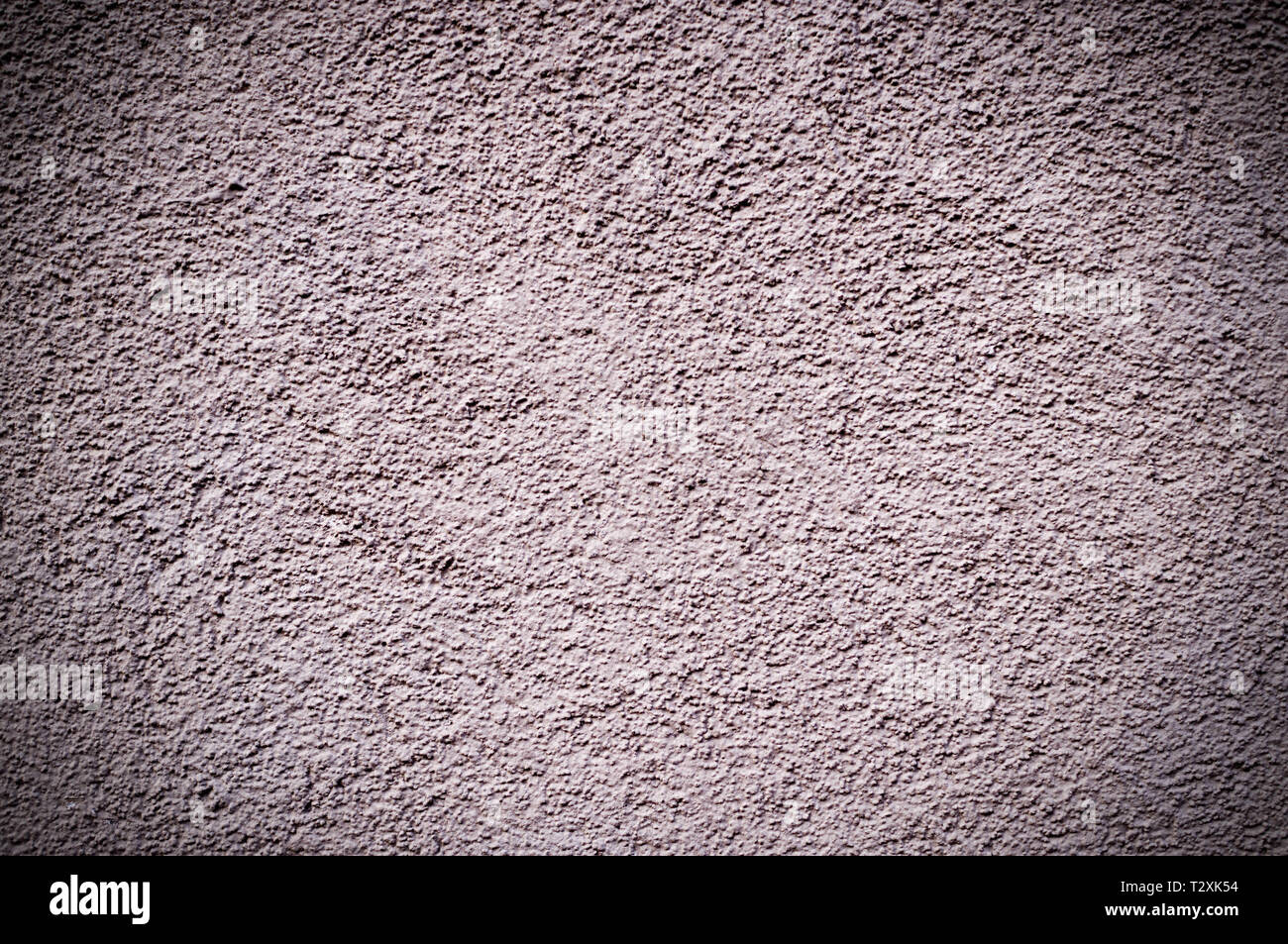 light-pink painted relief wall with vignette. background, texture Stock ...