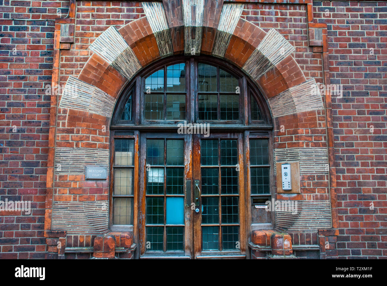 The front of an orange brick building with beautiful and distinctive ...