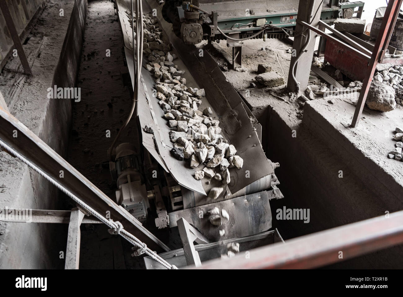 Industrial belt conveyor moving raw materials from mine Stock Photo - Alamy