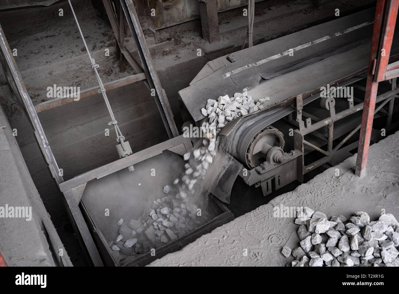 Industrial belt conveyor moving raw materials from mine Stock Photo - Alamy