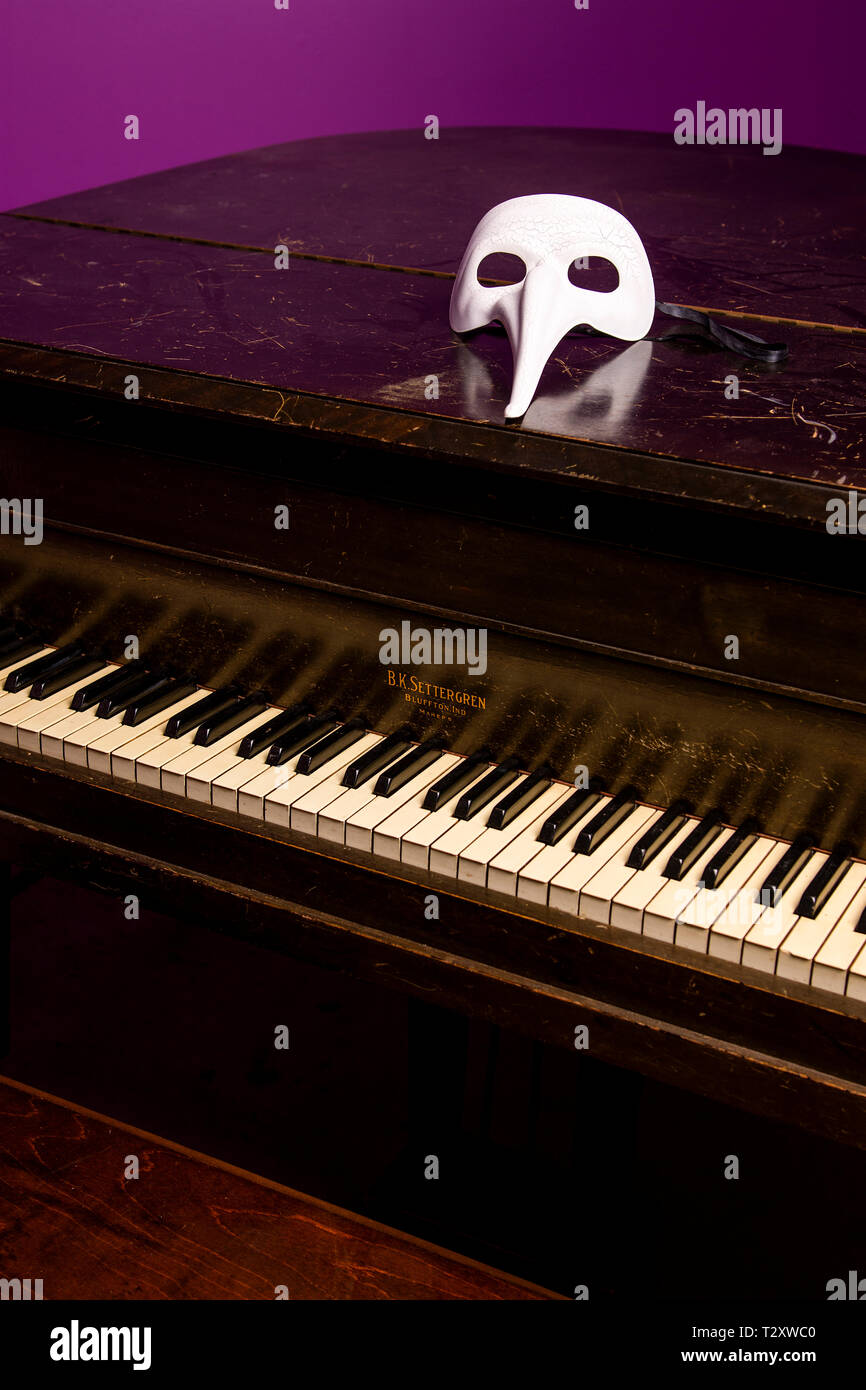 A white mask on a piano Stock Photo - Alamy