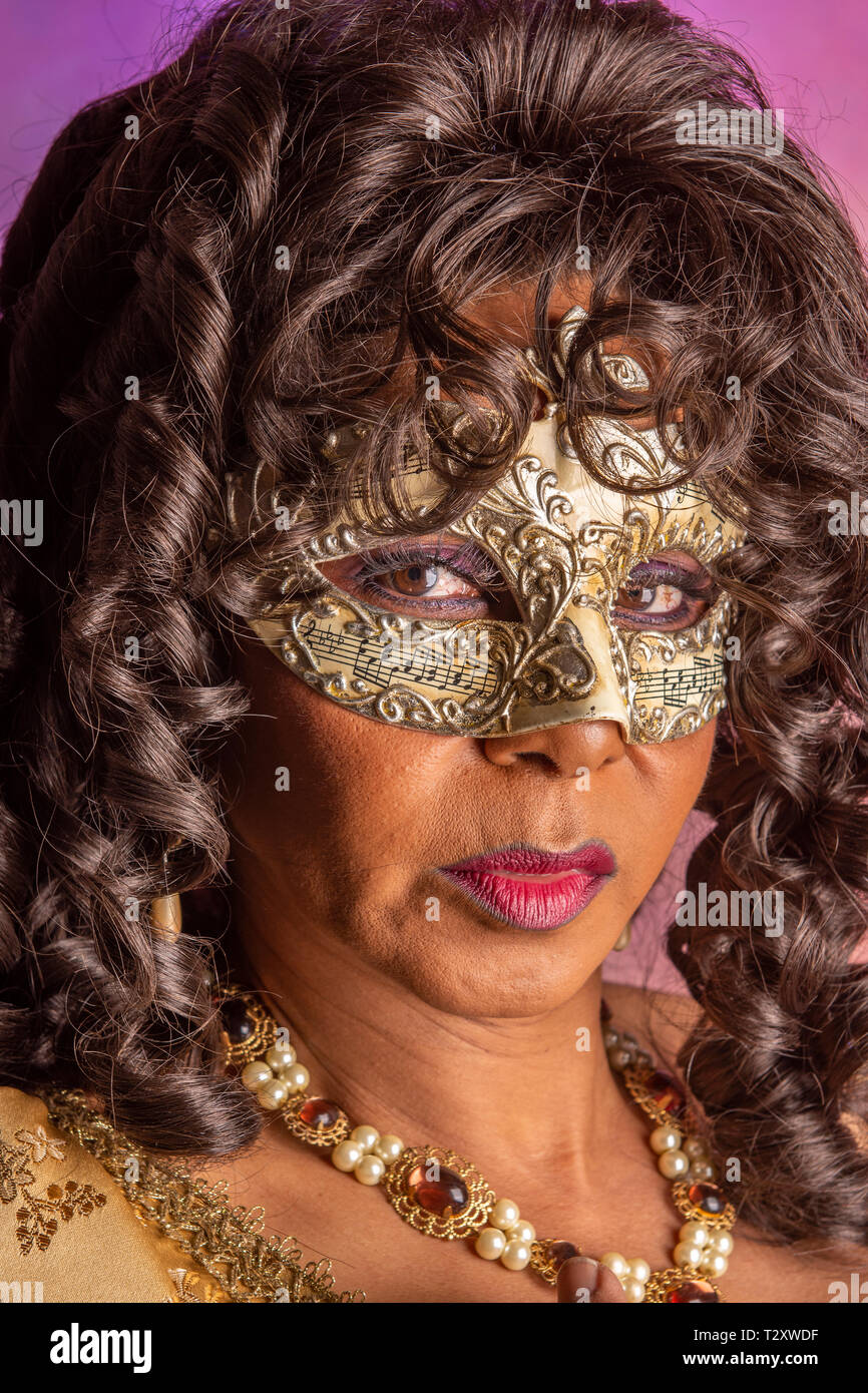 A middle aged, Puerto Rican, woman at a masquerade party Stock Photo ...