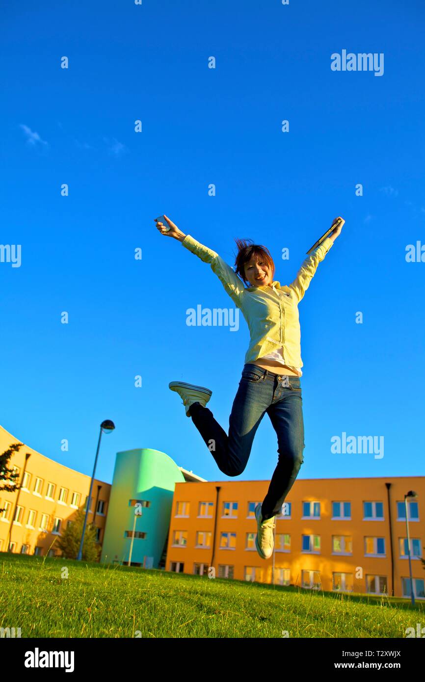 Asian Female Student Celebrating Stock Photo - Alamy