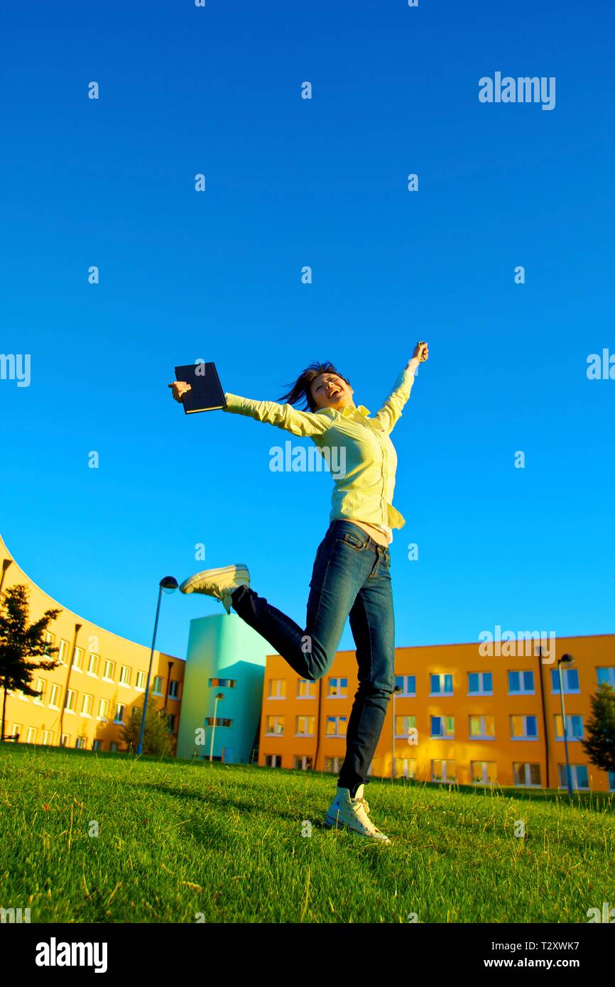 Asian Female Student Celebrating Stock Photo - Alamy