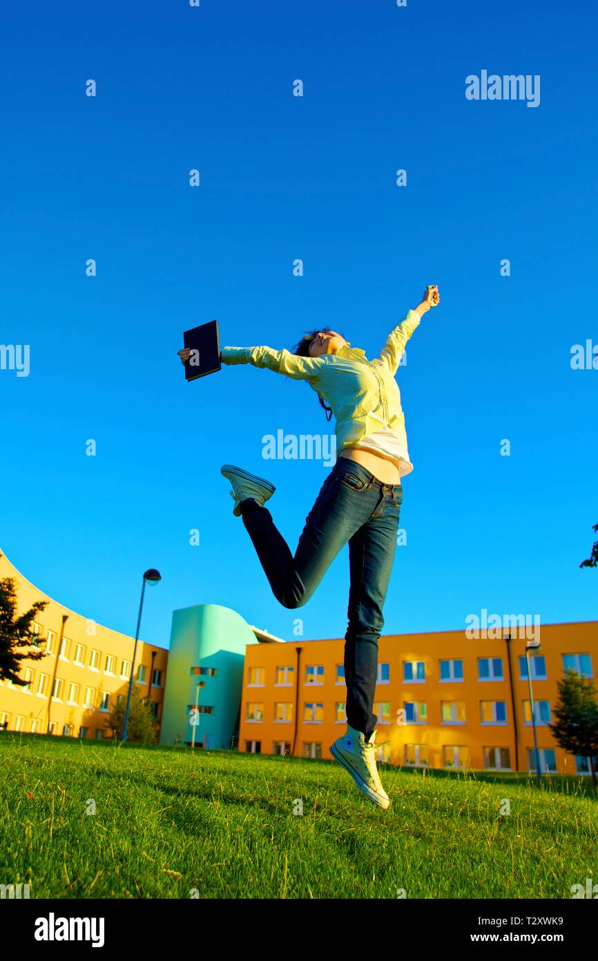 Asian Female Student Celebrating Stock Photo - Alamy
