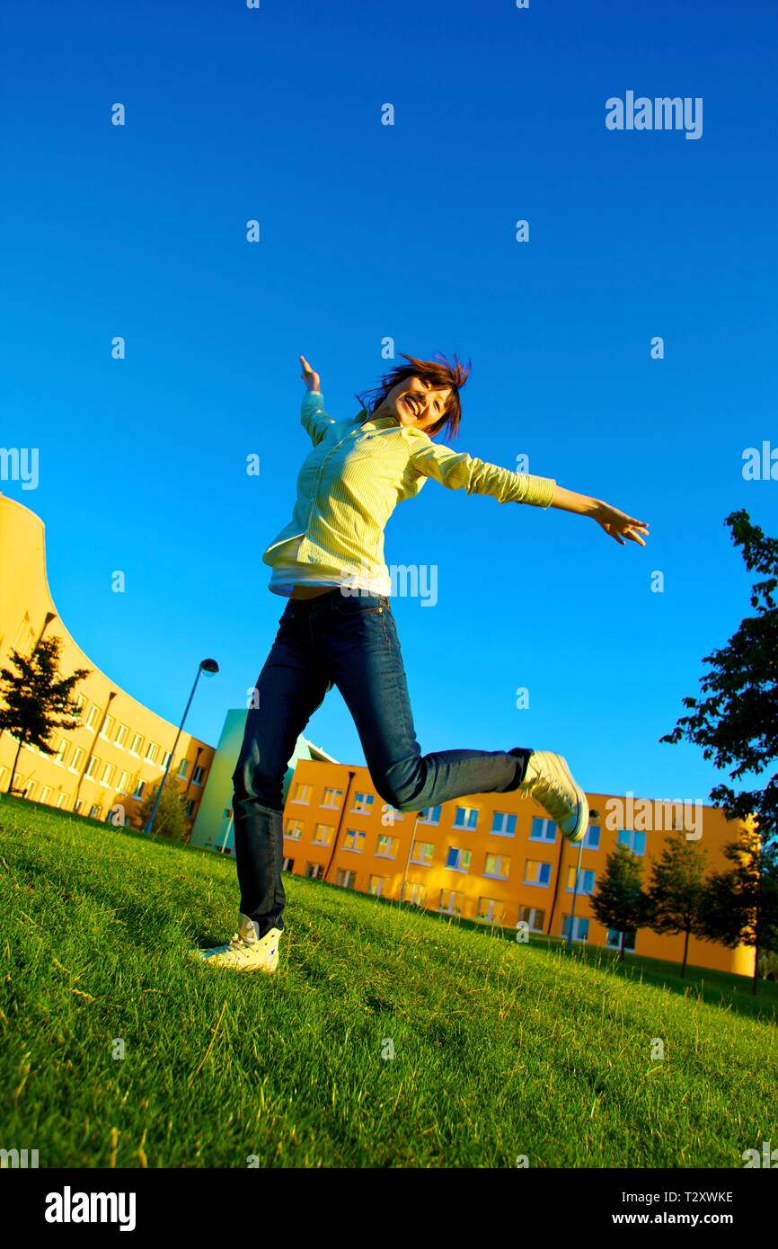 Asian Female Student Celebrating Stock Photo - Alamy