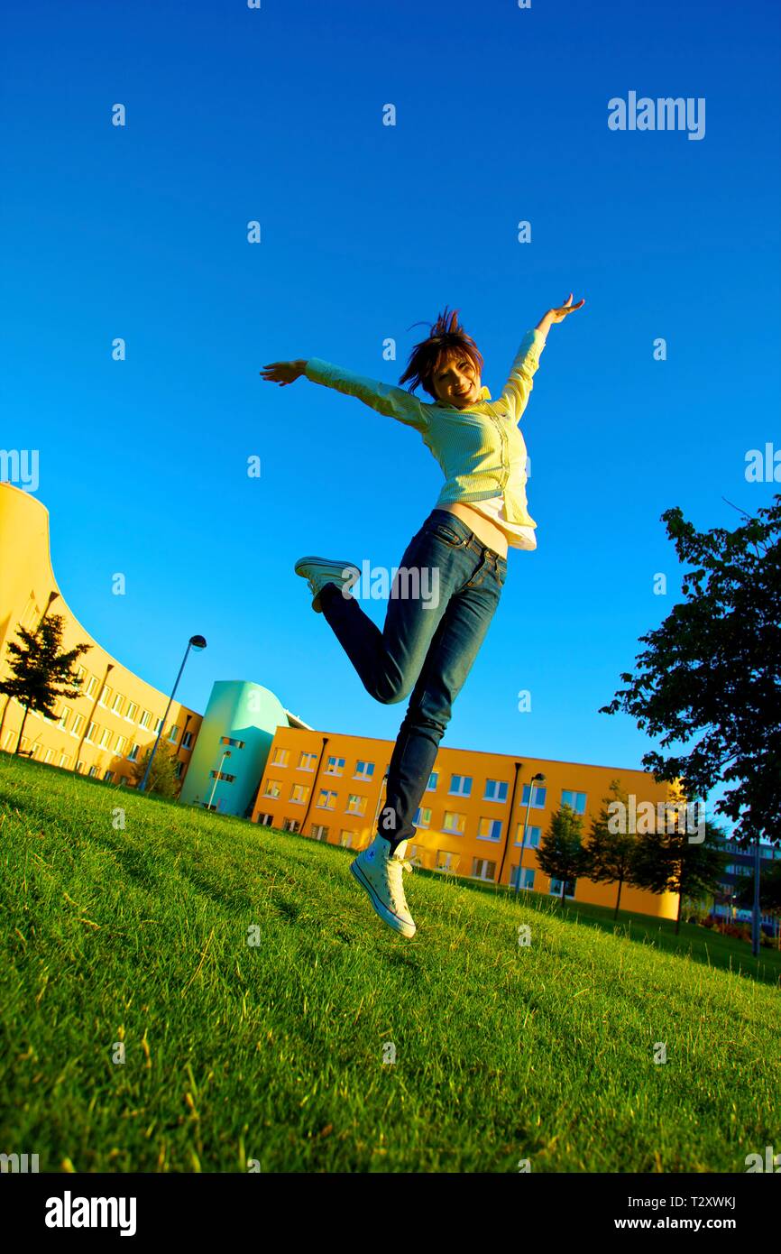 Asian Female Student Celebrating Stock Photo - Alamy