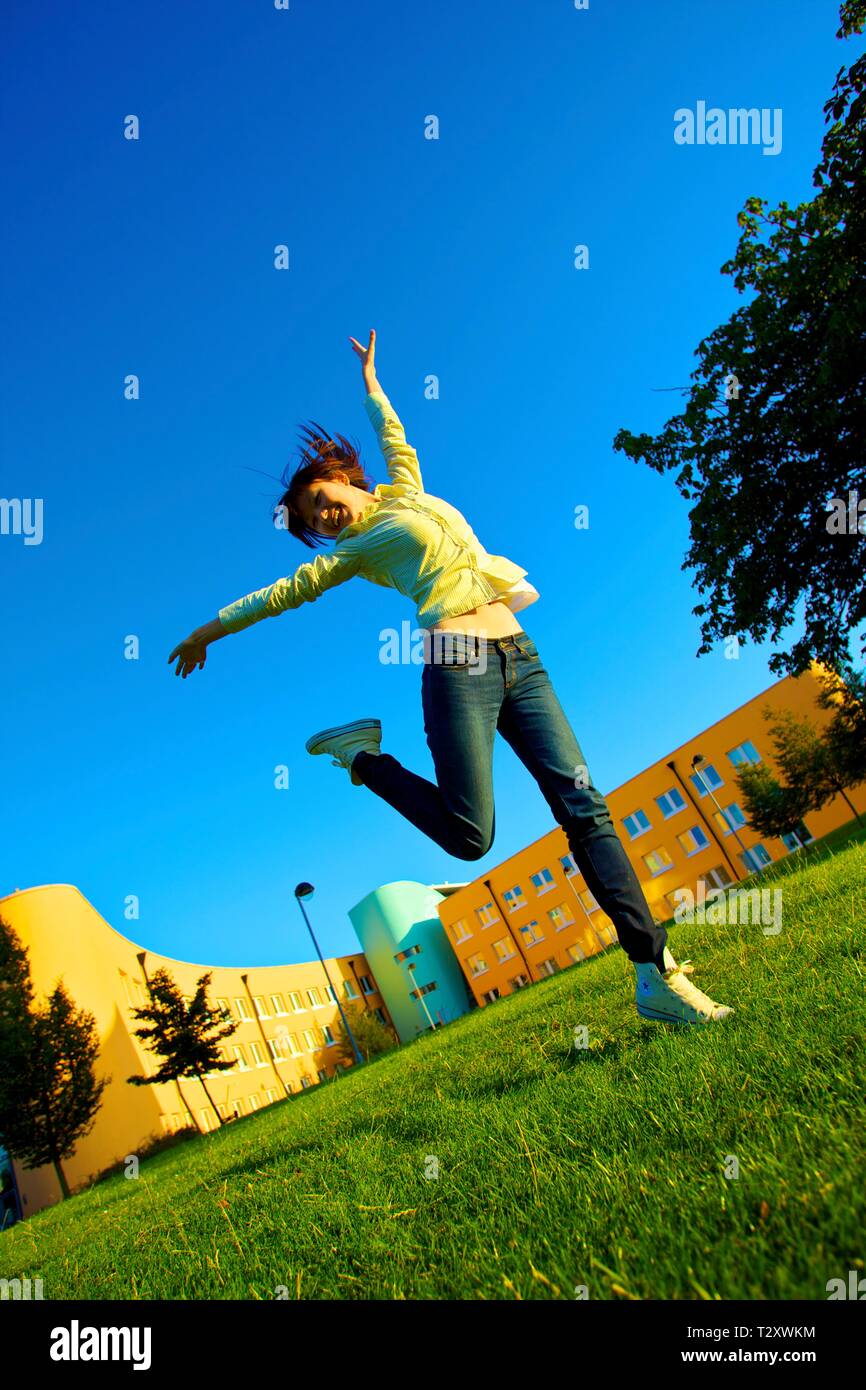 Asian Female Student Celebrating Stock Photo - Alamy