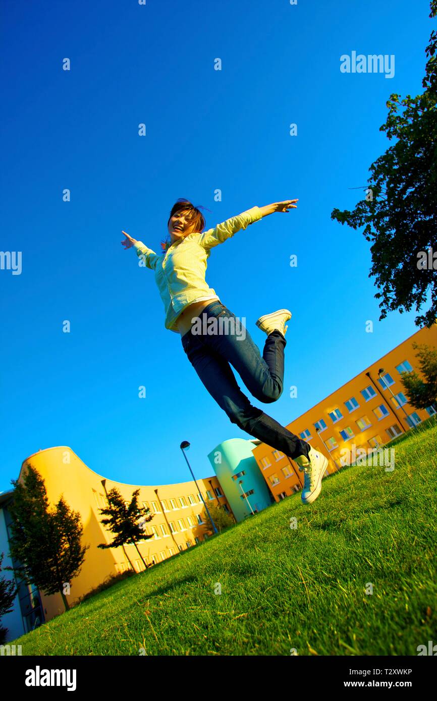 Asian Female Student Celebrating Stock Photo - Alamy