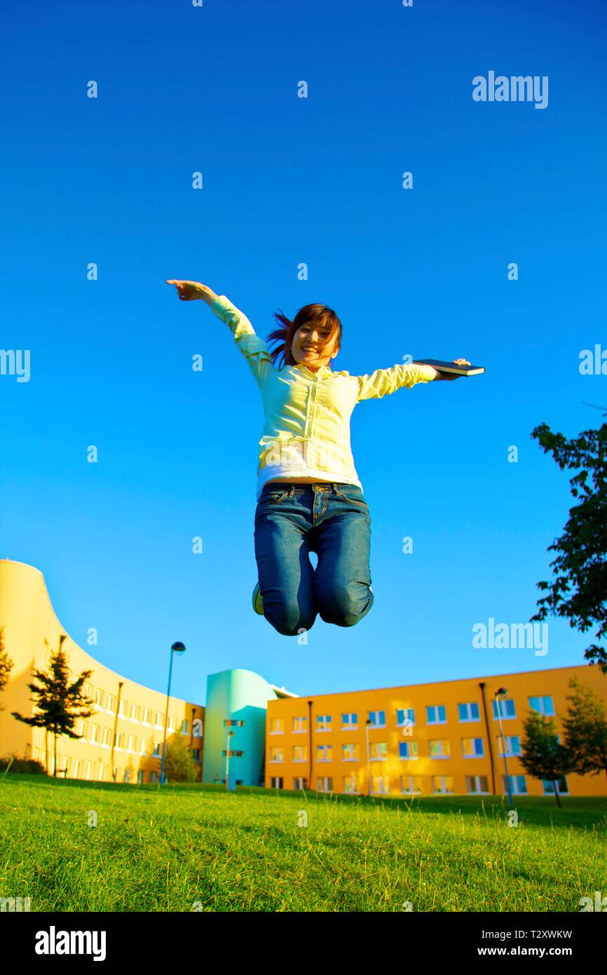 Asian Female Student Celebrating Stock Photo - Alamy