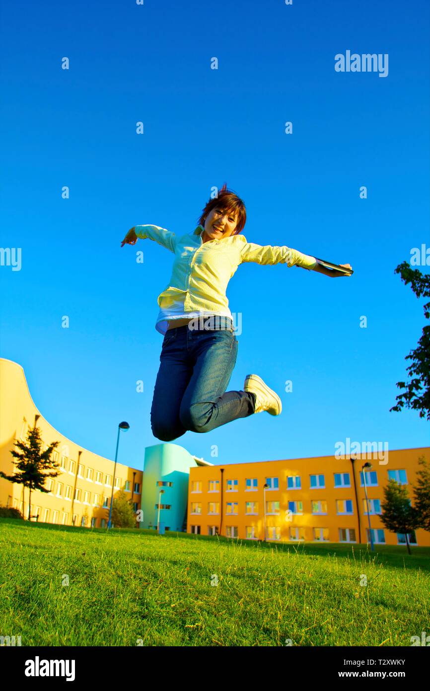 Asian Female Student Celebrating Stock Photo - Alamy