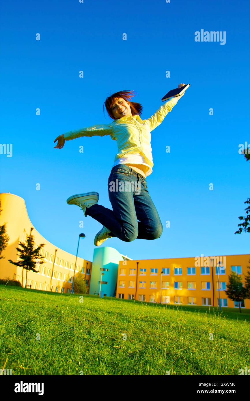 Asian Female Student Celebrating Stock Photo - Alamy
