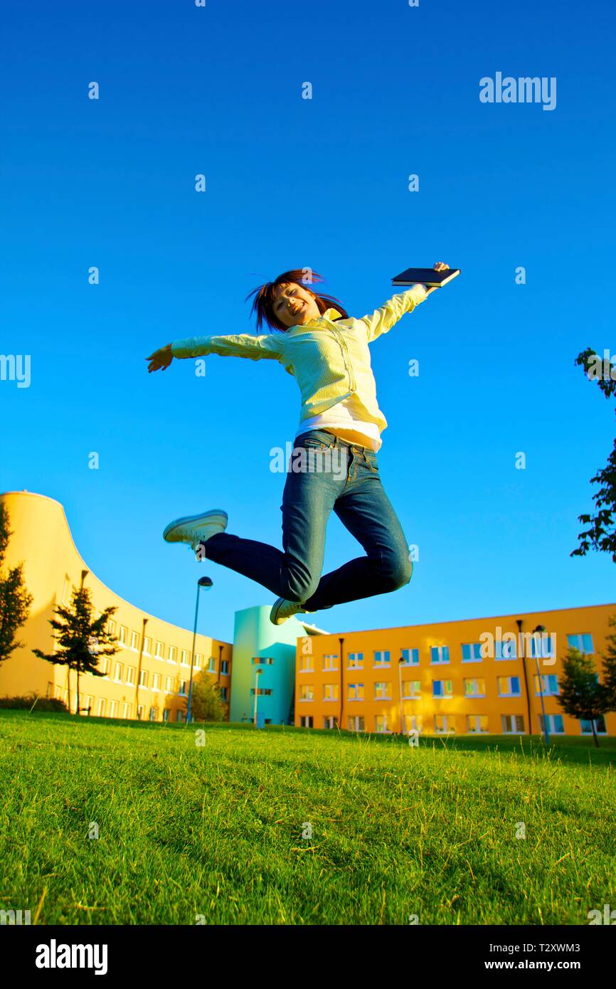 Asian Female Student Celebrating Stock Photo - Alamy