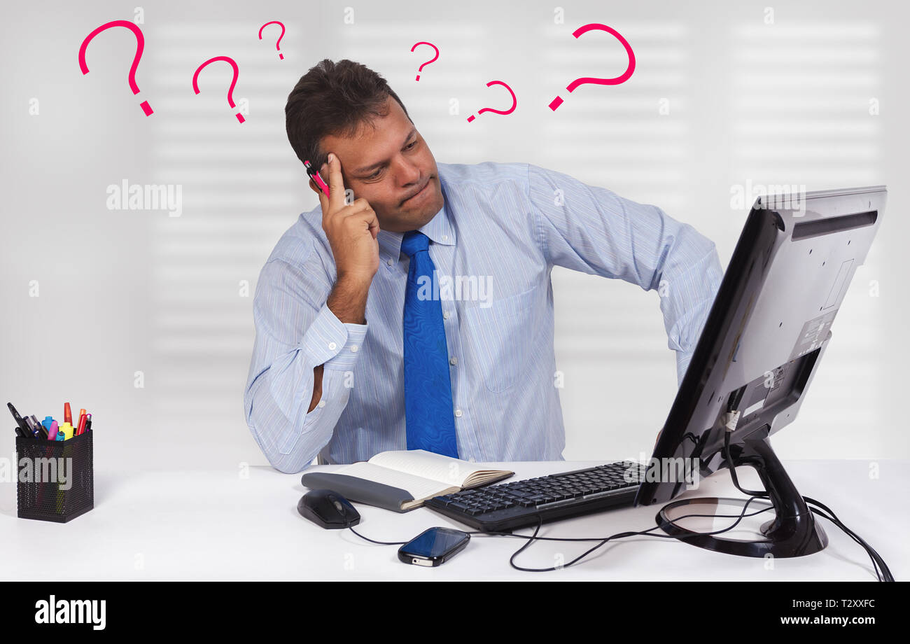 Man thinking question marks hi-res stock photography and images - Alamy