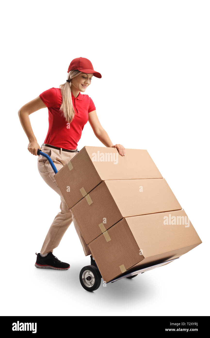 Female worker pushing a hand truck loaded with boxes isolated on white ...